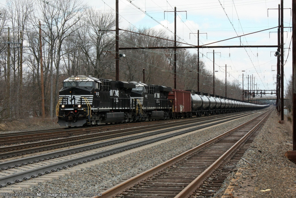 NS 8112 and empty oil train 65R